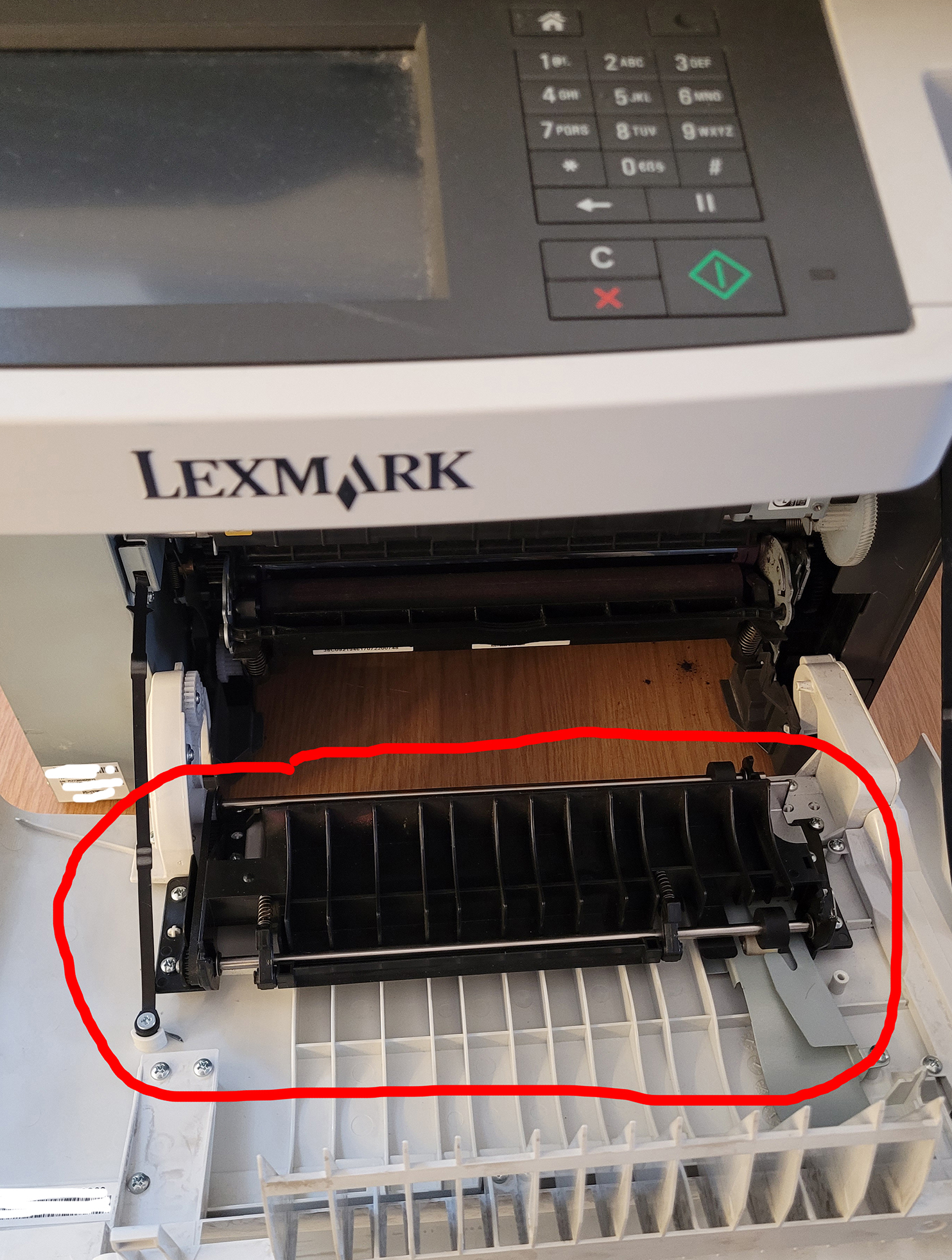 Lexmark CX 517de - poszukiwany element na zdjęciu, przyczyna zacinania kartek, naprawa